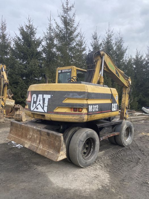 Koparka kołowa caterpillar m312 Nysa • OLX.pl