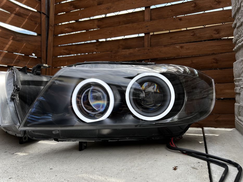 BMW E90 E91 Bi xenon lewy prawy lampa lampy reflektory Ostrów Wielkopolski • OLX.pl