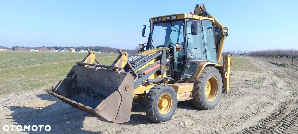 Używany Caterpillar 428D 2002 - 95 000 PLN - Otomoto.pl