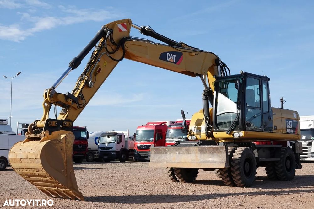 Utilizat Cat M318D / EXCAVATOR ROTI / 2013 / 2013 - 54 900 EUR - Autovit.ro
