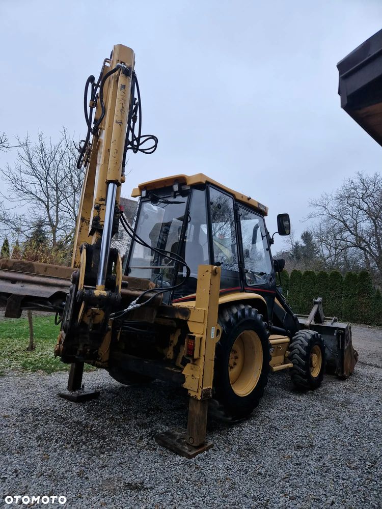 Używany Caterpillar CAT 428 C 1998 - 92 500 PLN - Otomoto.pl