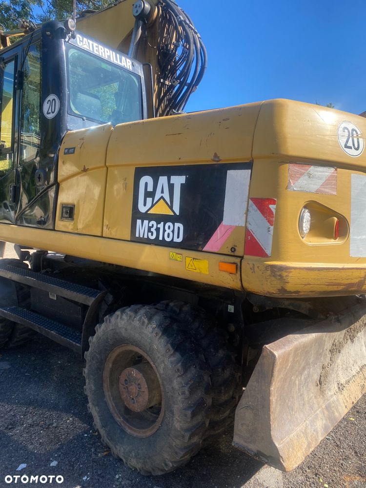 Używany Caterpillar 318D 2010 - 145 000 PLN - Otomoto.pl