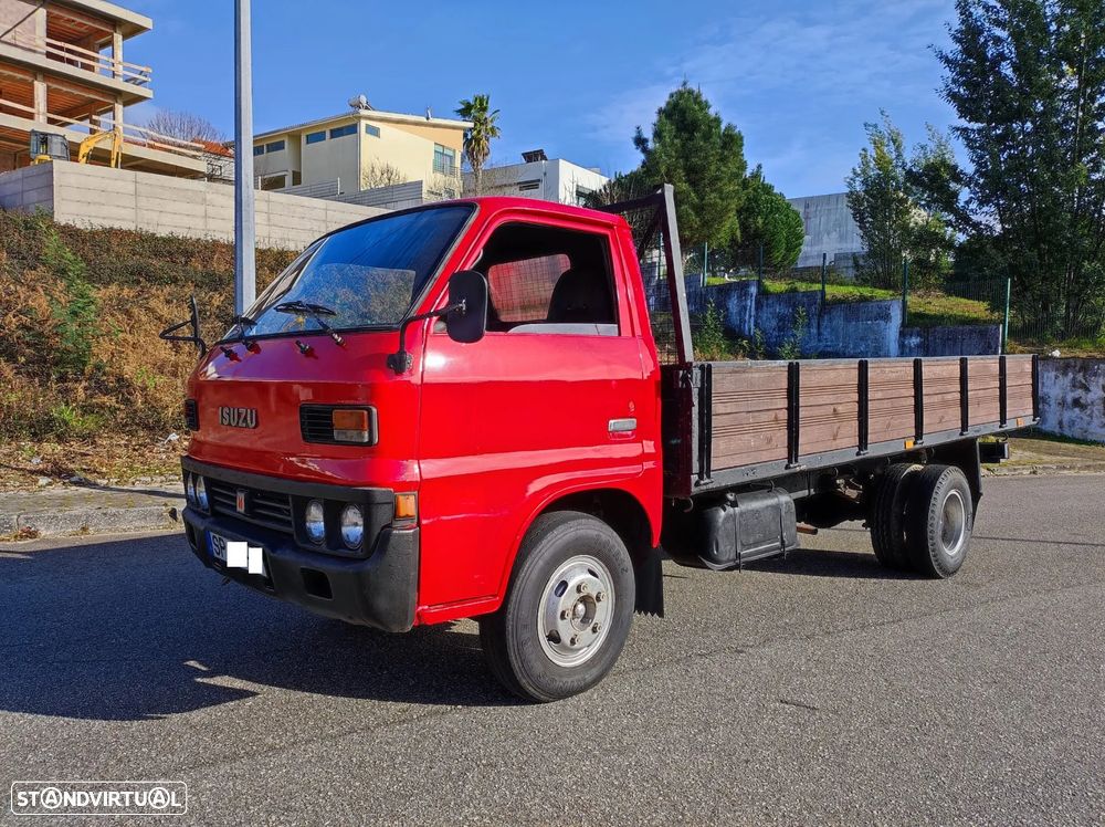 Usados Isuzu NKR 2.4 Diesel - Cx. Aberta - 3 Lug. - 3 465 EUR, 233 000 ...