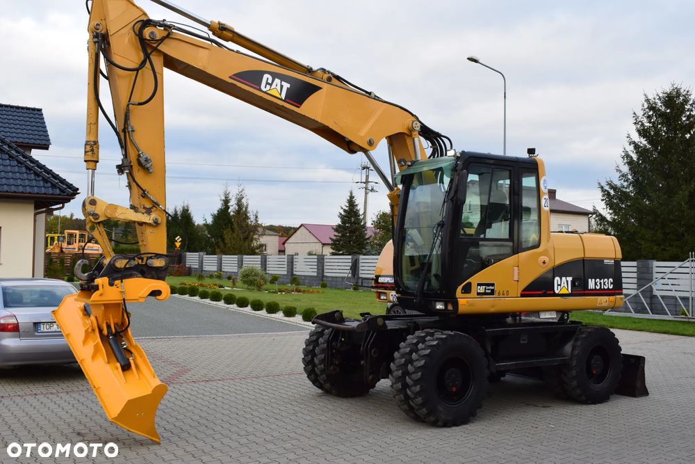 Używane Caterpillar CAT M313C - 179 000 PLN - Otomoto