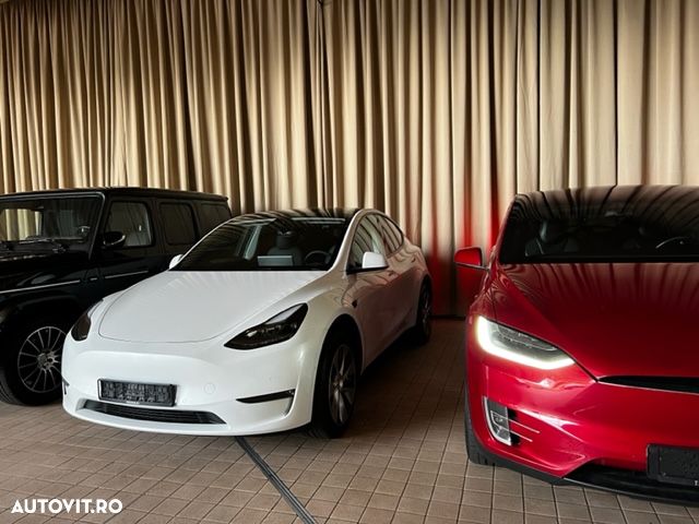 Second hand Tesla Model Y - 52 990 EUR, 23 000 km, 2022 - autovit.ro