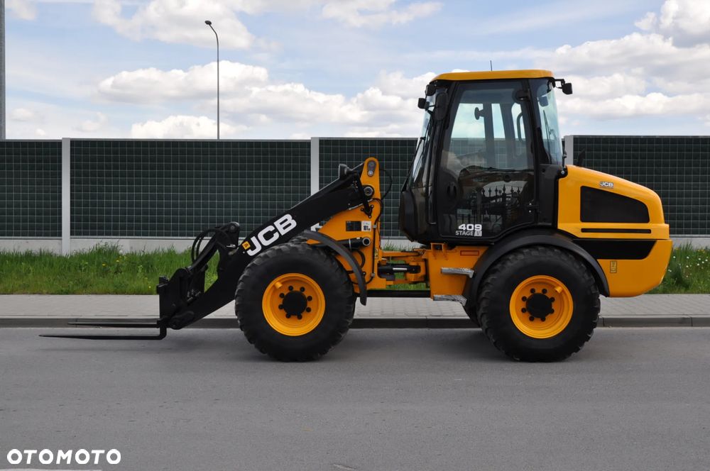 Używane JCB WLS 409 SV MAŁO MTG 359 WIDŁY DO PALET KRAJOWA I WŁAŚCICIEL ...