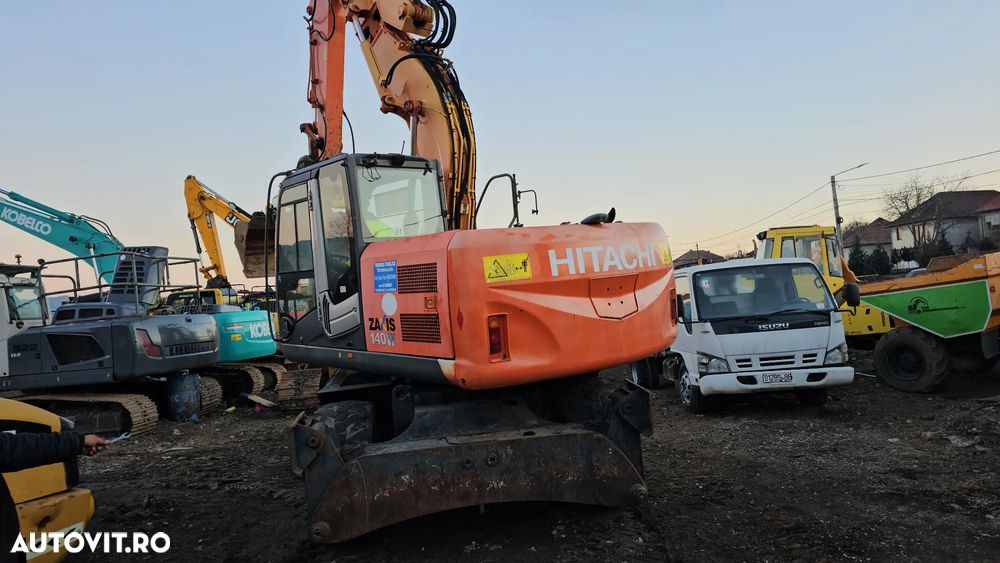 Second hand Hitachi Zaxis 140 W Excavator pe roți - 31 900 EUR - Autovit