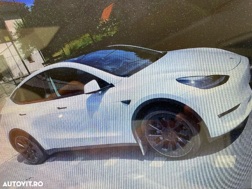 Second hand Tesla Model Y - 50 000 EUR, 2 500 km, 2023 - autovit.ro