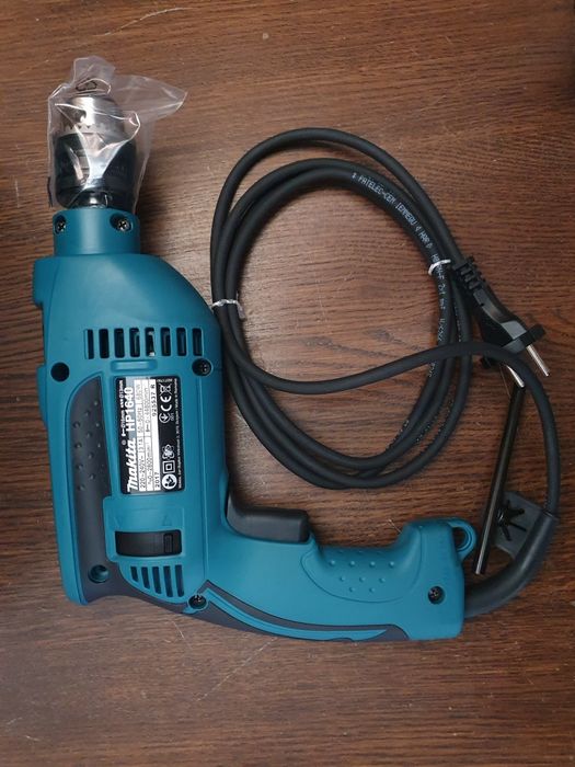 Дриль ударна Marita HP 1640, Кутова шліфувальна машинка Makita 9558 HN ...