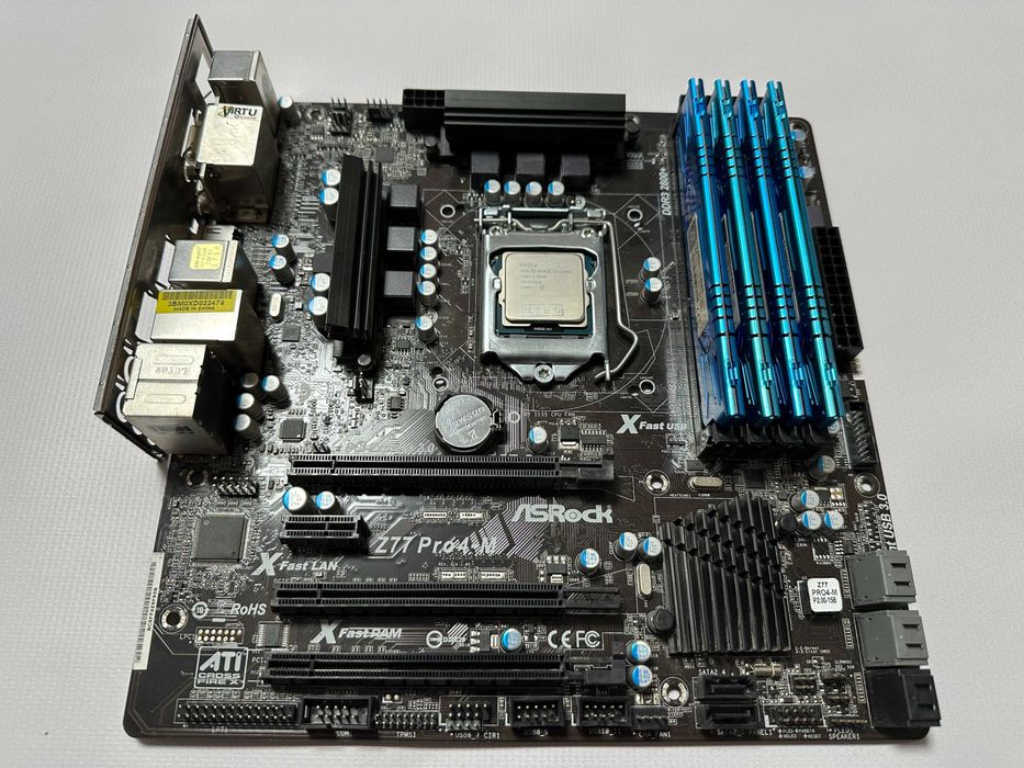 Материнская плата ASRock Z77 Pro4-M 1155: 3 099 грн. - Комплектуючі та ...