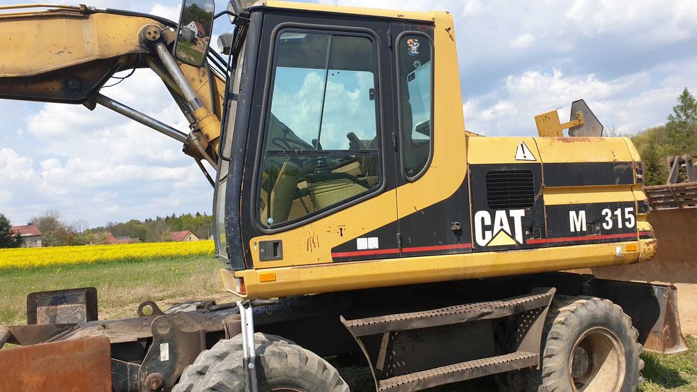 Koparka caterpillar cat m 315 m312 m318 części Biała • OLX.pl