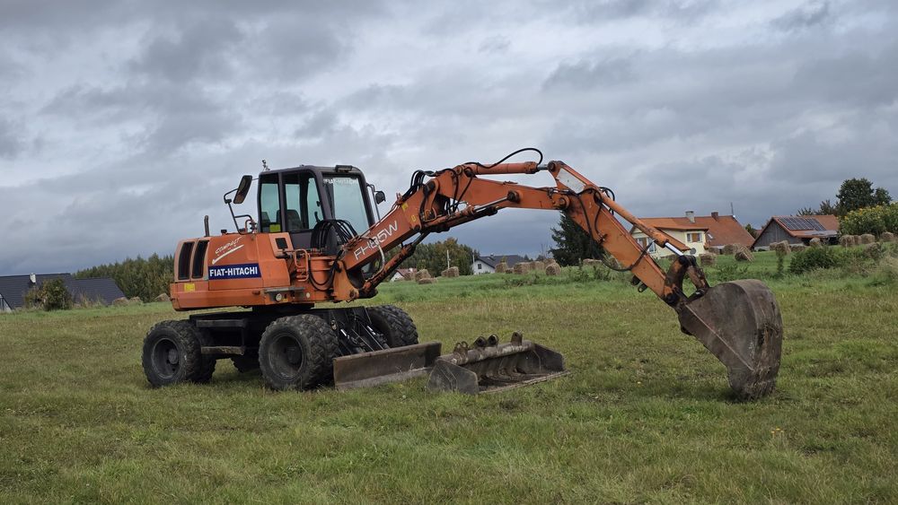 Koparka kołowa Hitachi FH85W Compact line, Koparka 9 t Pasłęk • OLX.pl